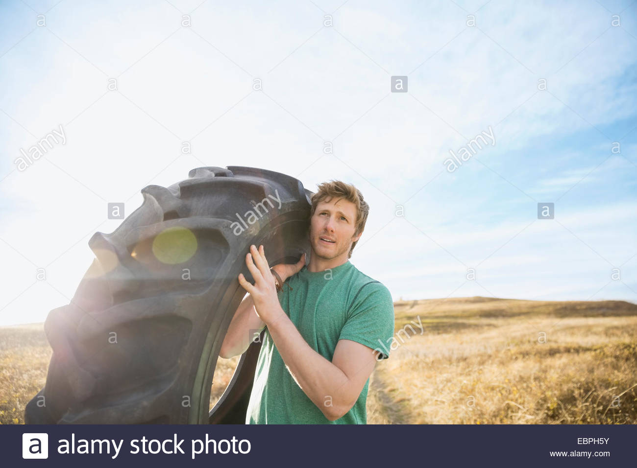 Man carrying field hi-res stock photography and images - Alamy