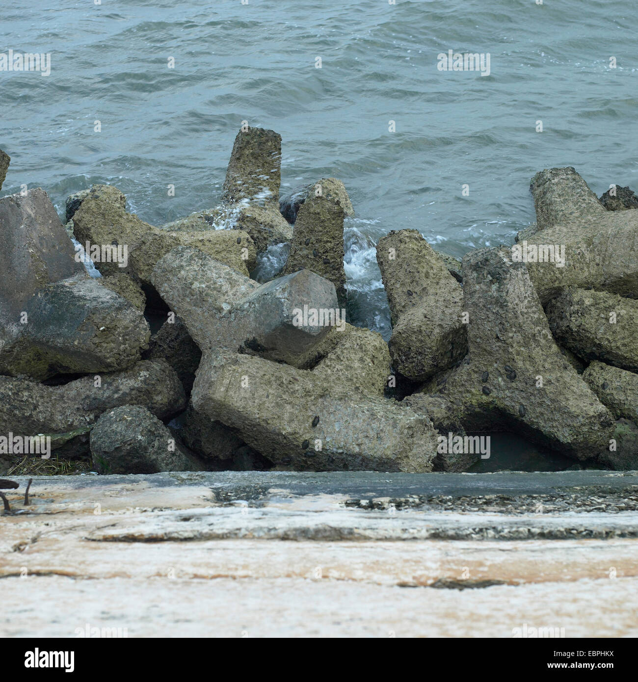Concrete star shaped blocks on the side of the ocean Stock Photo - Alamy