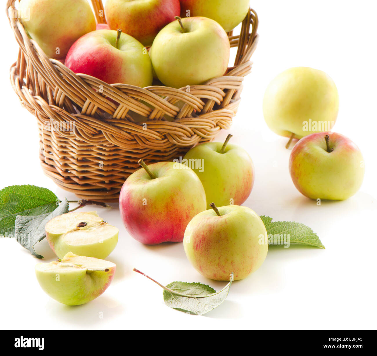 Apples in basket isolated on white background Stock Photo - Alamy