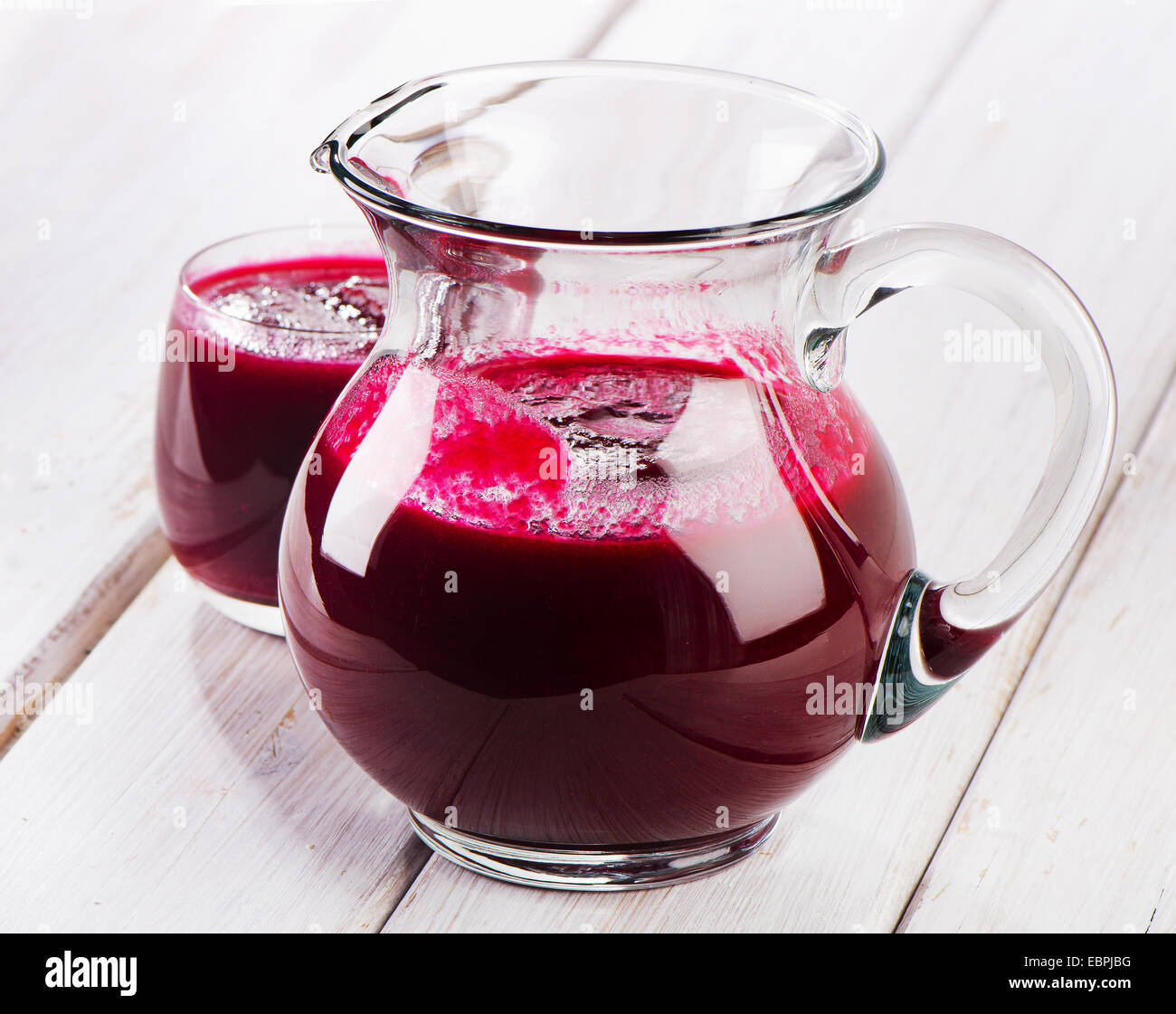 Beetroot juice in a glass jug. Selective focus Stock Photo - Alamy