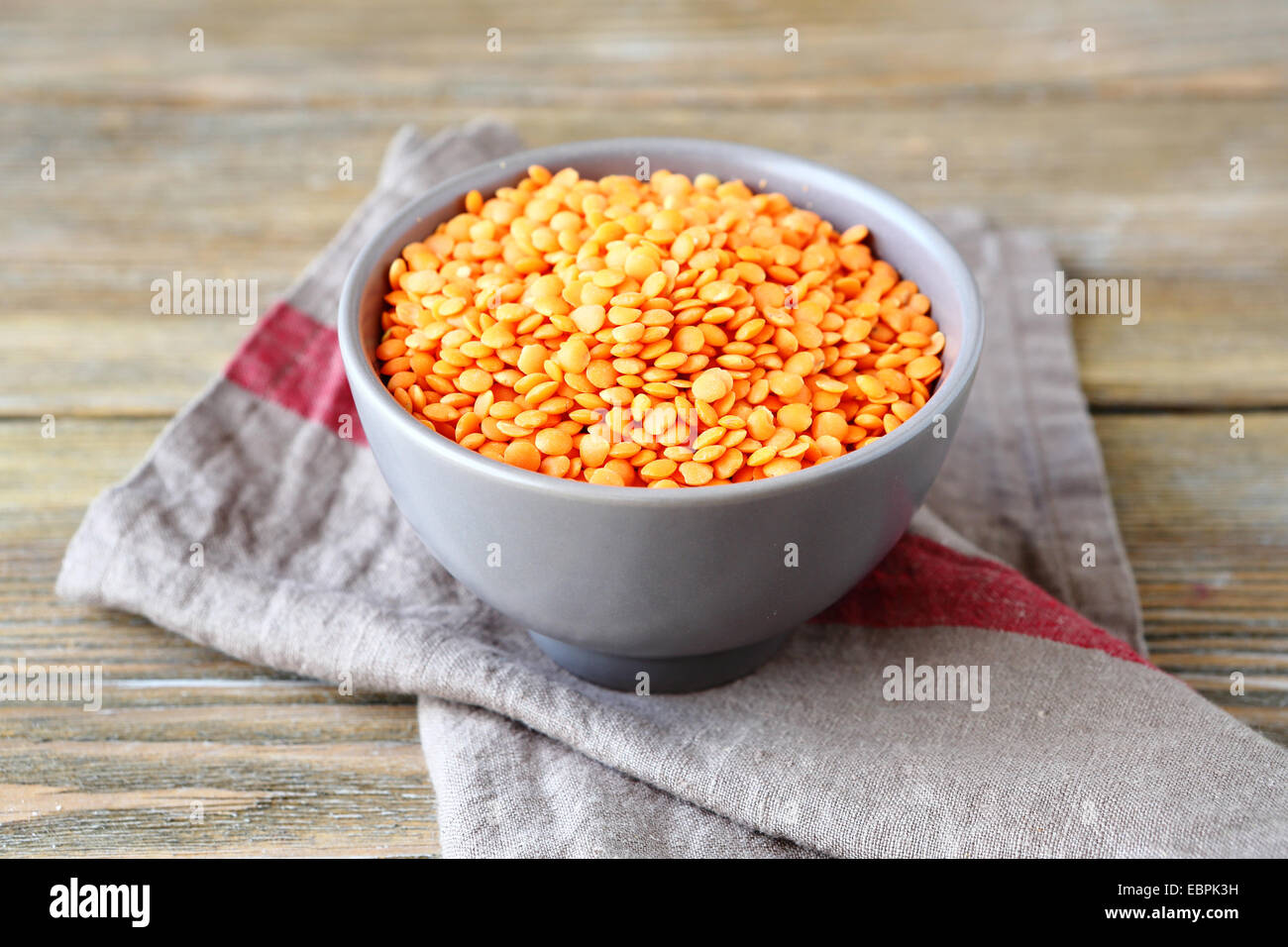 Uncooked pink lentils in a bowl, healthy food Stock Photo - Alamy