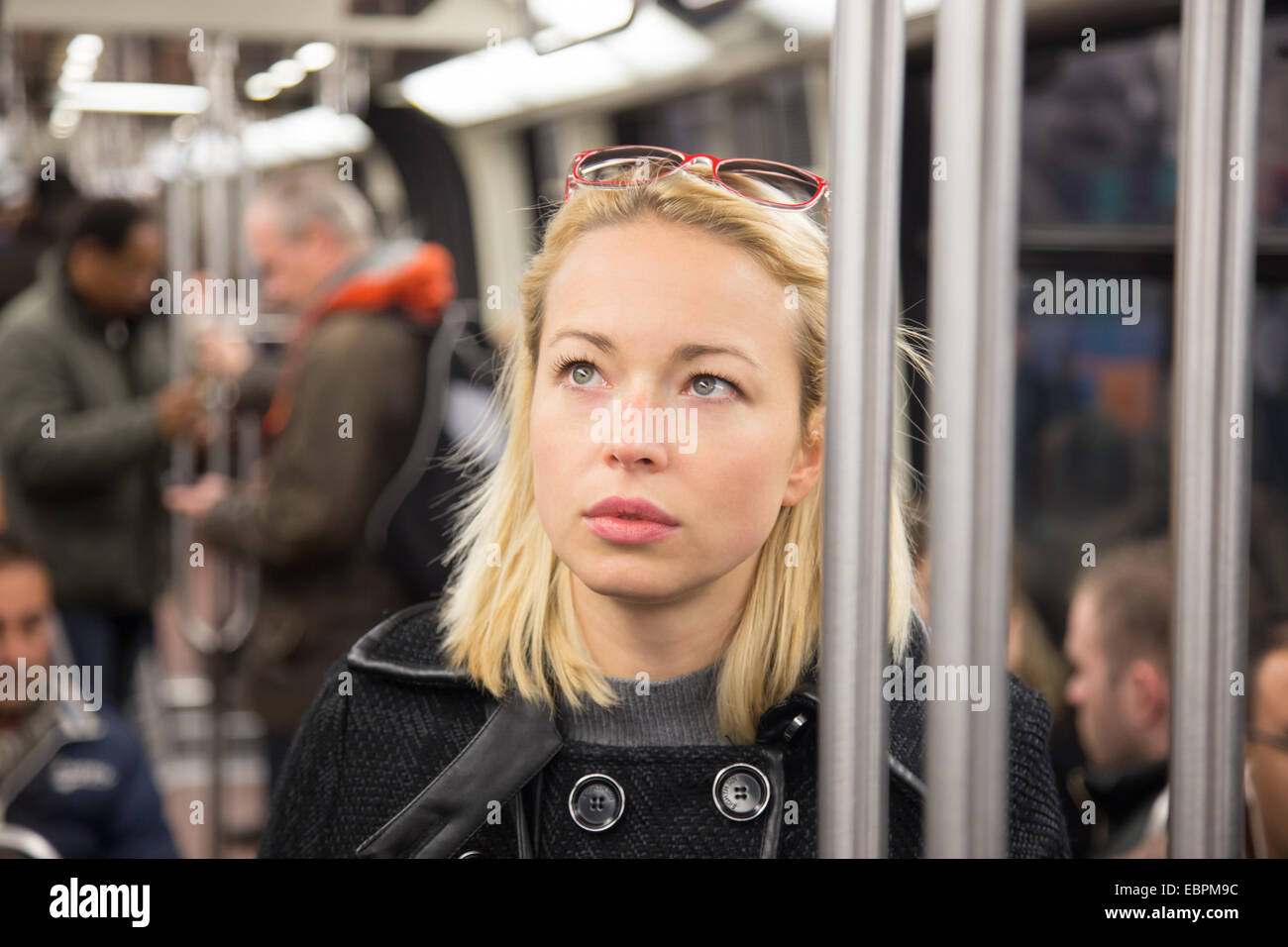 Woman on subway Stock Photo - Alamy