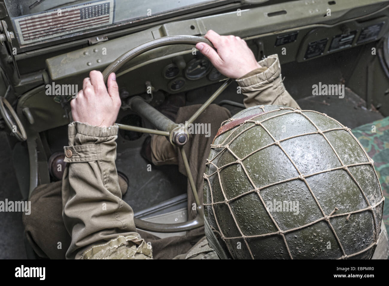 driver of a military vehicle of World War II with green helmet Stock ...