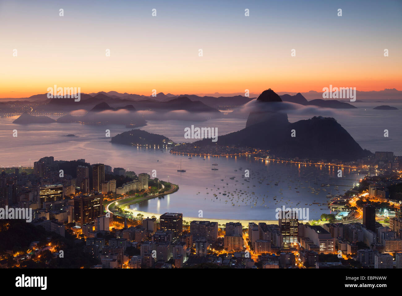 View of Sugarloaf Mountain and Botafogo Bay at dawn, Rio de Janeiro ...
