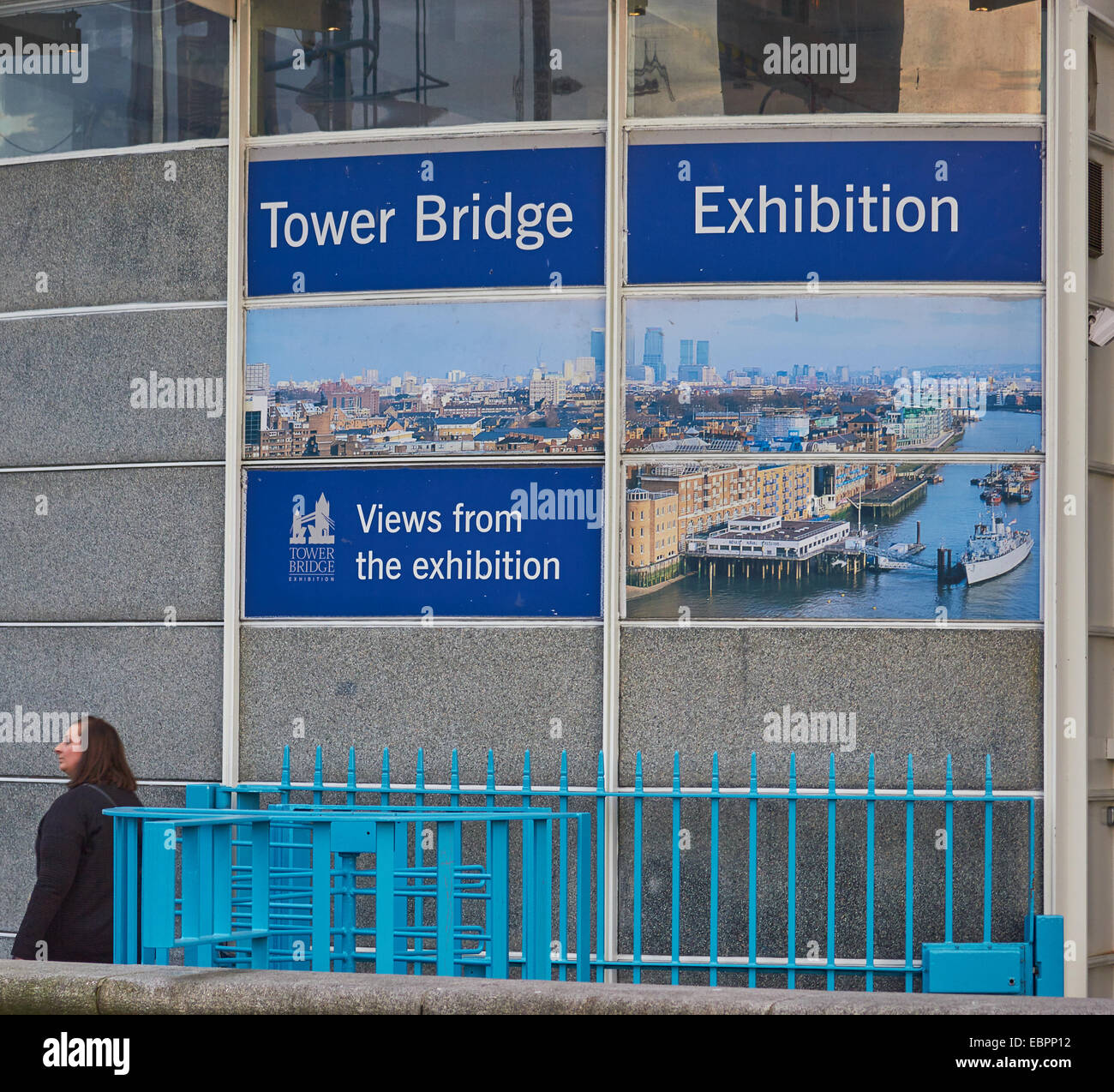 Female tourist at entrance to Tower Bridge exhibition London England ...