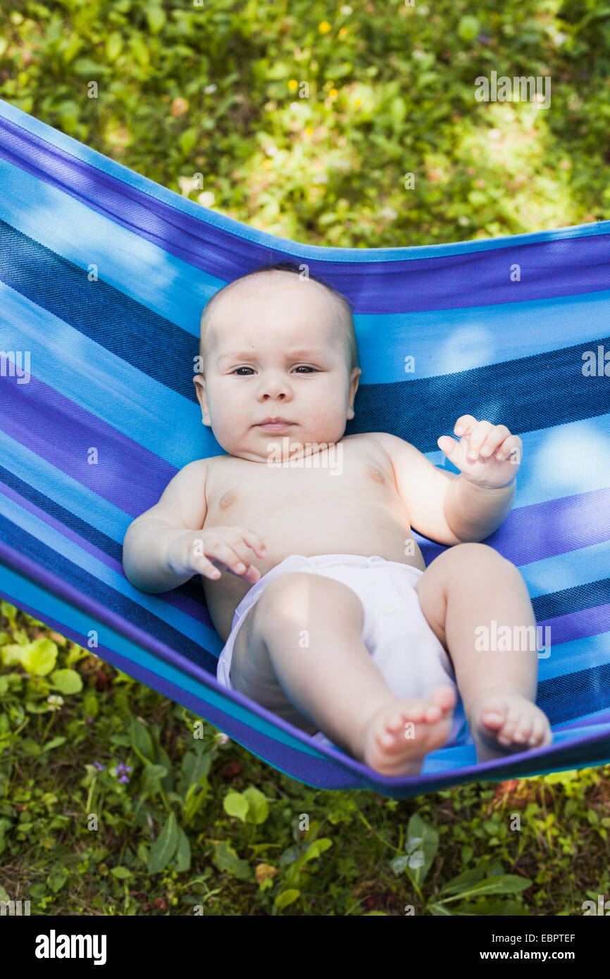 Baby in a hammock Stock Photo - Alamy