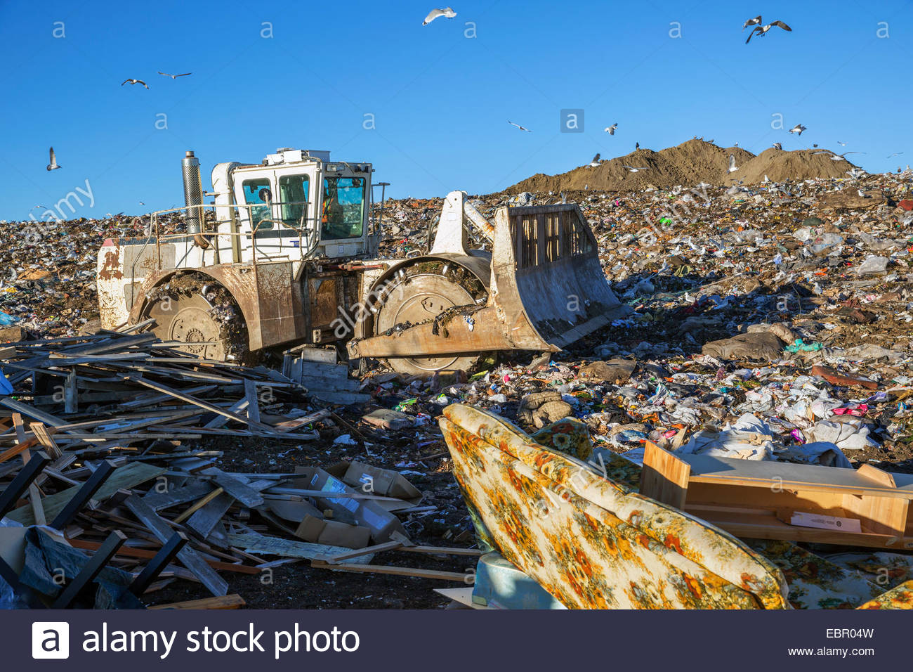 Garbage dump bulldozer hi-res stock photography and images - Alamy