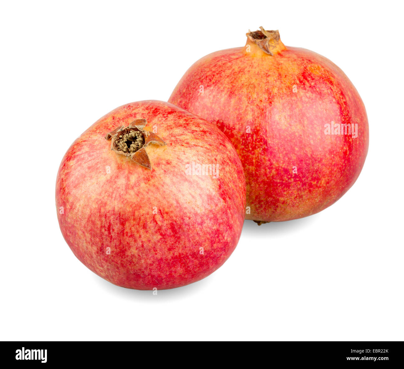 Two juicy pomegranate Stock Photo - Alamy