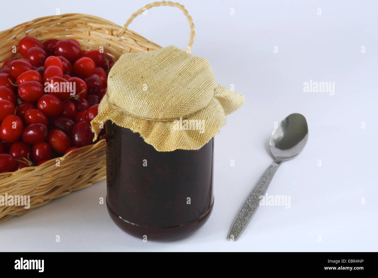 cornel in basket and homemade jam Stock Photo - Alamy