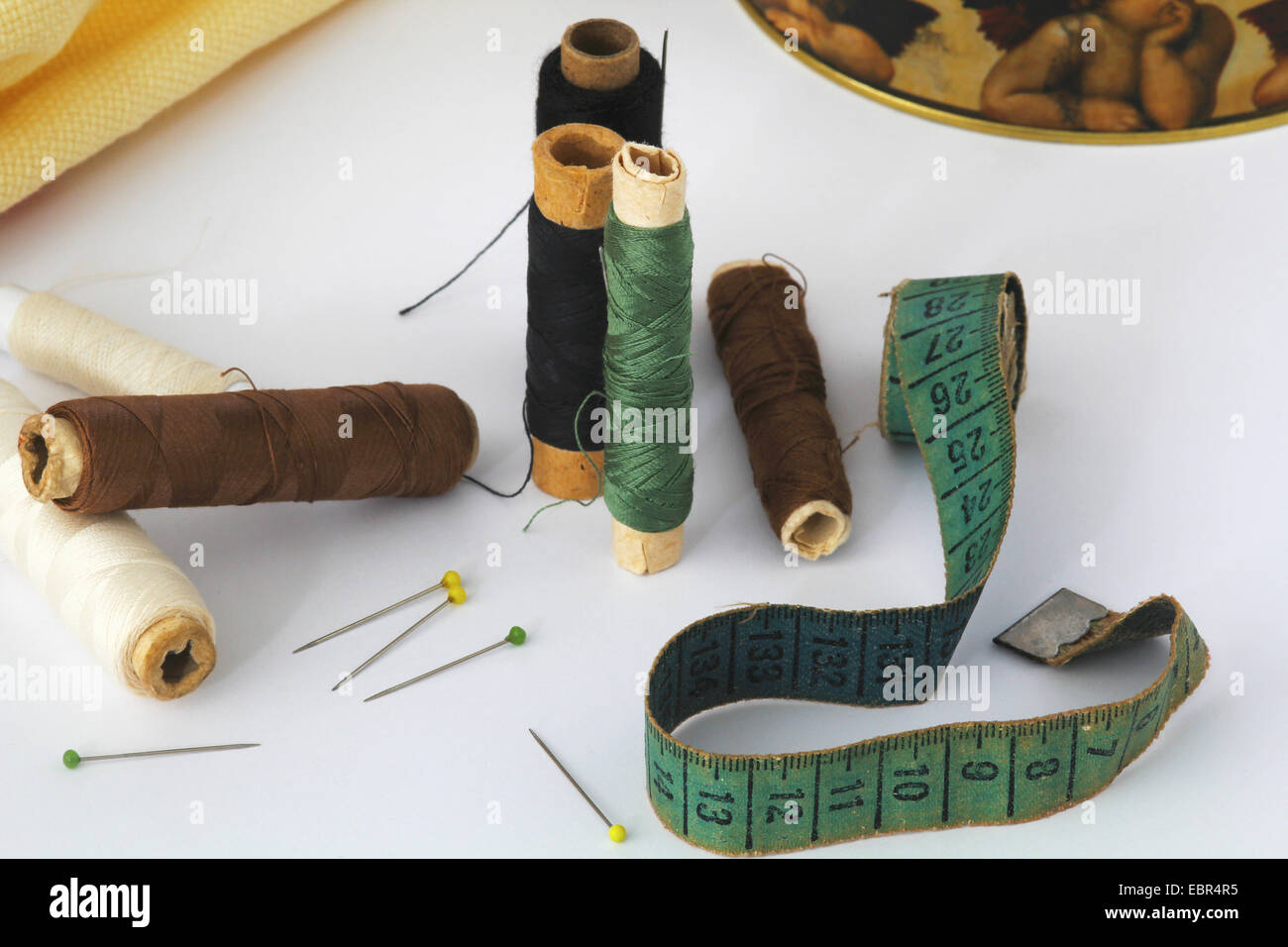 needles and thread for sewing work Stock Photo - Alamy