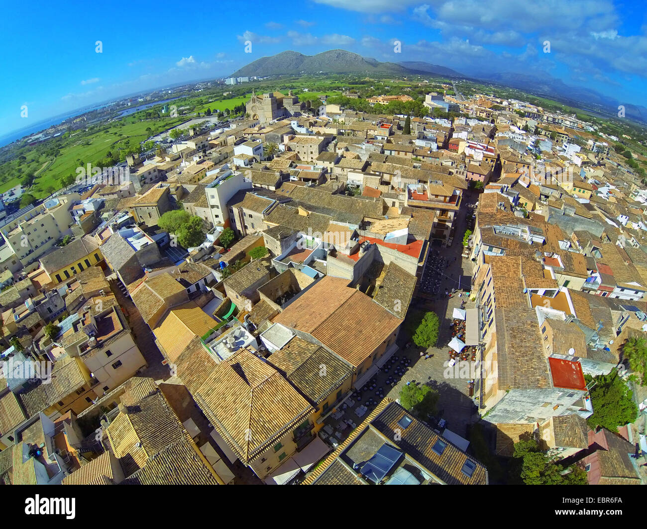 aerial view to the old city, Atalaya de Alcudia mountain range in ...
