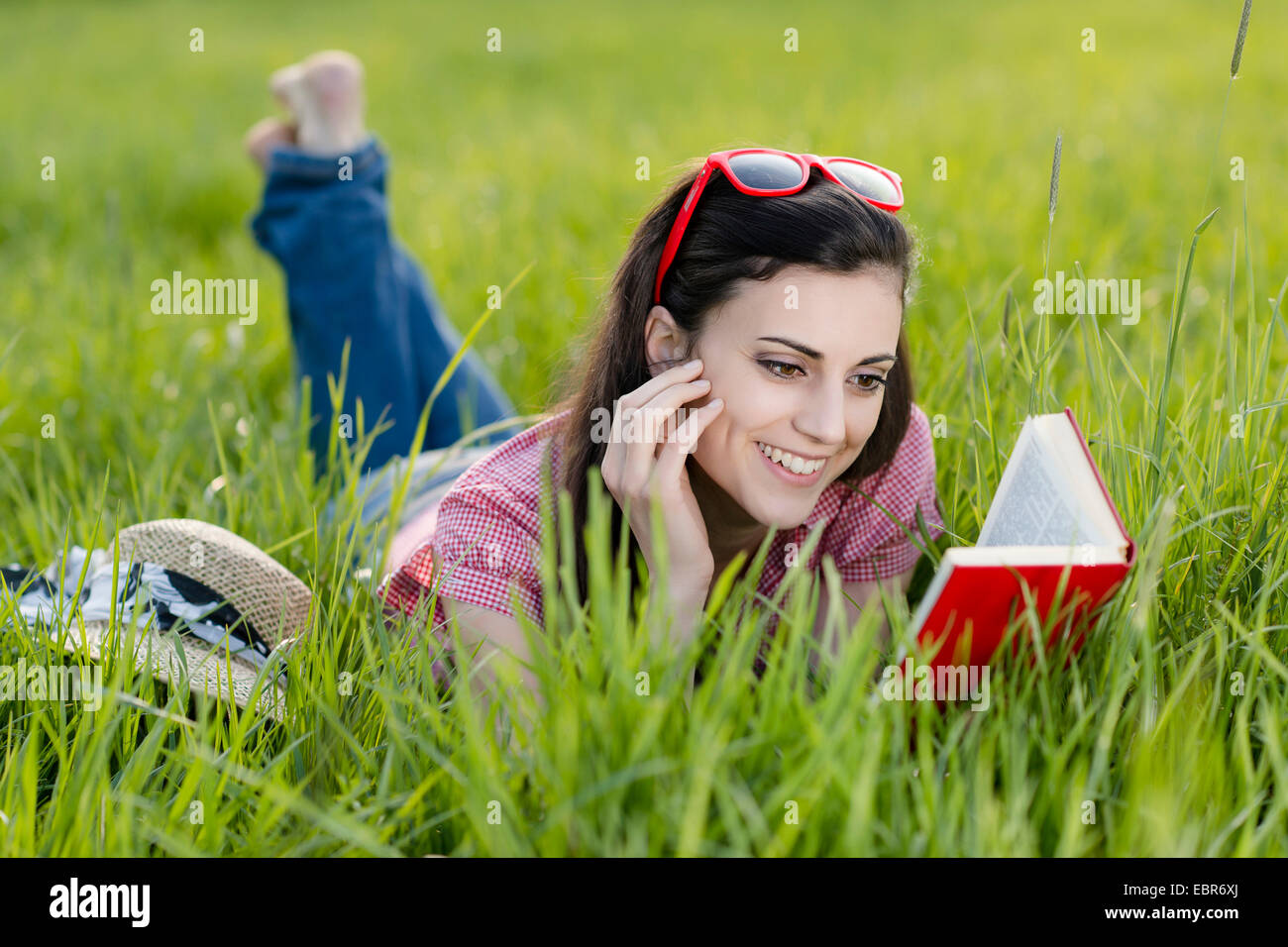 Woman face reading smiling close hi-res stock photography and images ...