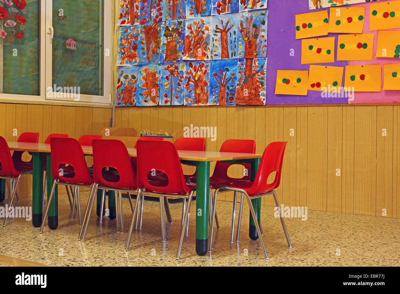 red chairs and benches of a school for young children Stock Photo - Alamy