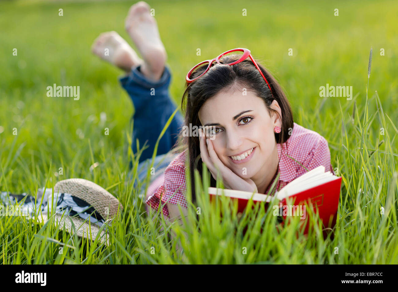 Woman face reading smiling close hi-res stock photography and images ...