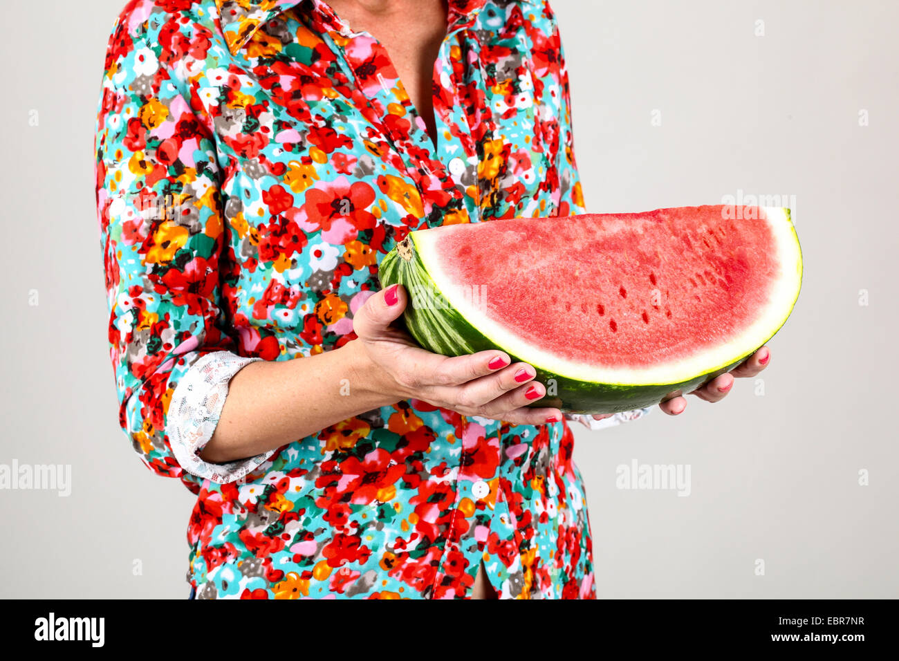 Woman with watermelon slice Stock Photo - Alamy