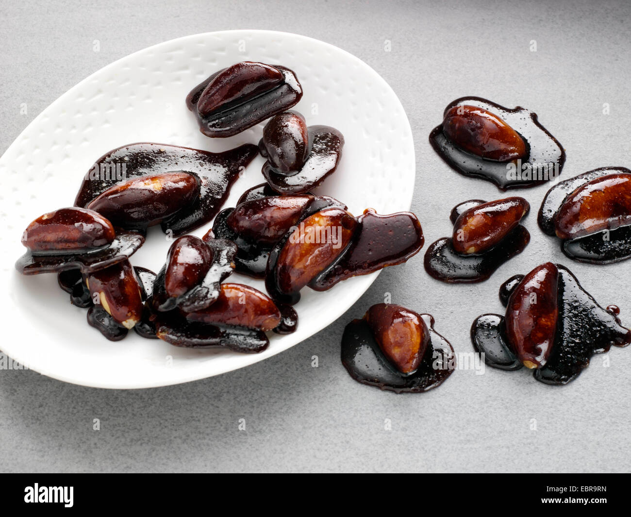 Sticky brazil nuts coated hi-res stock photography and images - Alamy
