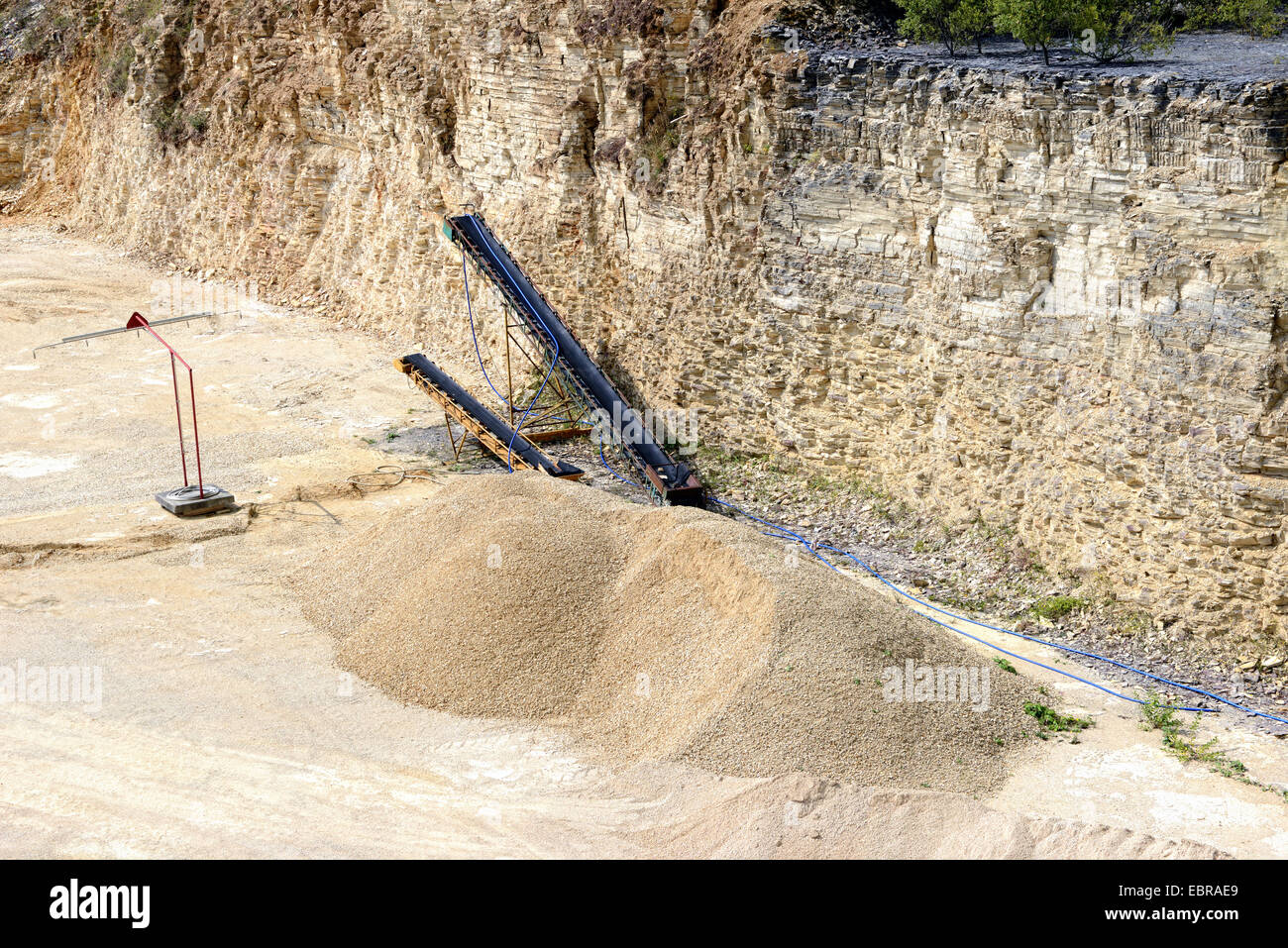 sedimentary rocks at a limestone quarry. open pit mine. mining industry ...