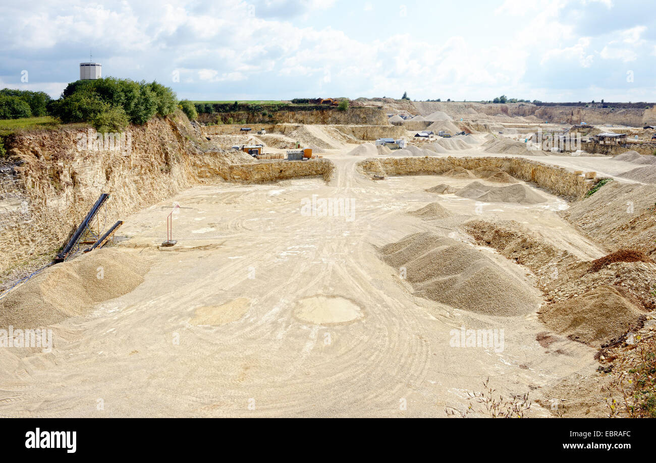 sedimentary rocks at a limestone quarry. open pit mine. mining industry ...