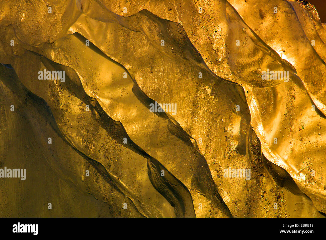 iceberg glows golden in evening light, Norway, Svalbard Stock Photo - Alamy