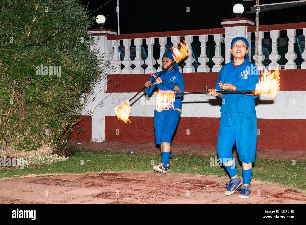 Tibetan fire dancers performing in gardens of a hotel in Goa for ...