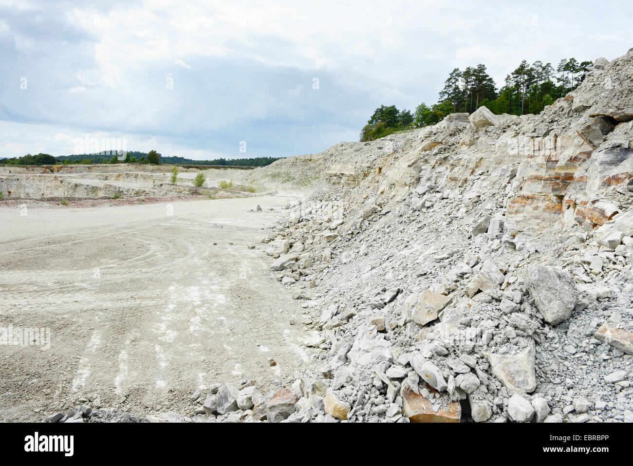 sedimentary rocks at a limestone quarry. open pit mine. mining industry ...