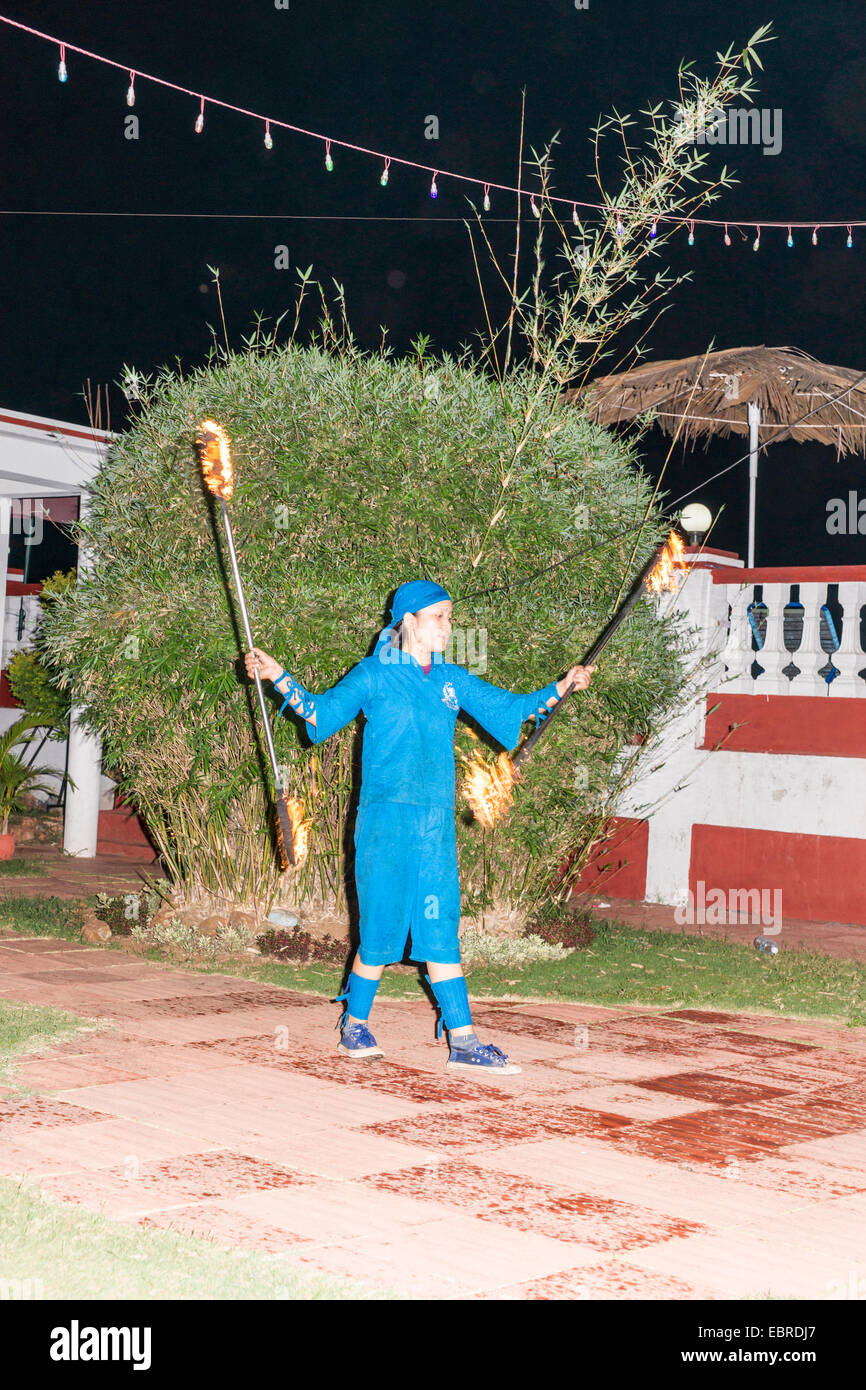 Tibetan fire dancers performing in gardens of a hotel in Goa for ...