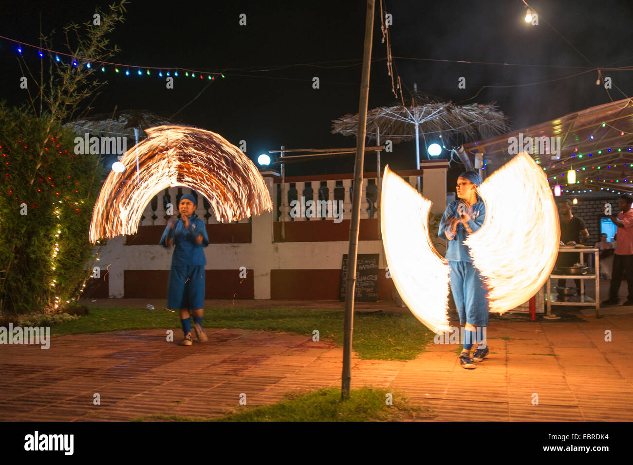 Tibetan fire dancers performing in gardens of a hotel in Goa for ...