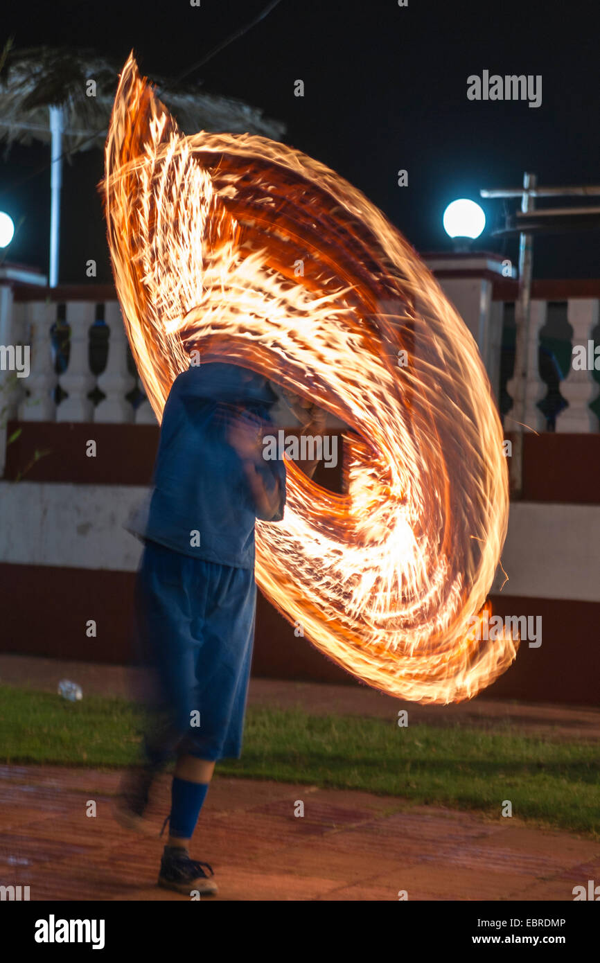 Tibetan fire dancers performing in gardens of a hotel in Goa for ...