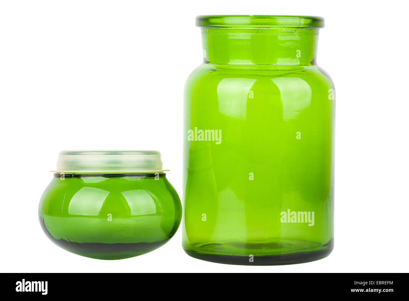 Green glass chemical bottle with the ground stopper isolated on white ...