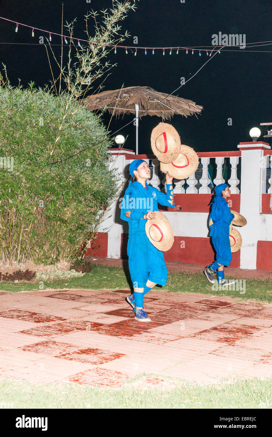 Tibetan fire dancers performing in gardens of a hotel in Goa for ...