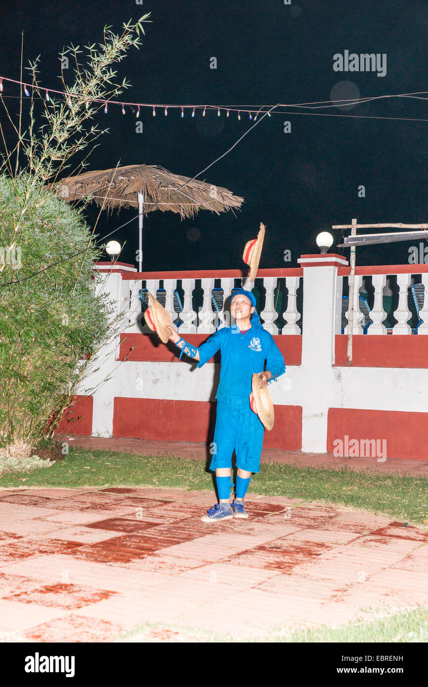 Tibetan fire dancers performing in gardens of a hotel in Goa for ...