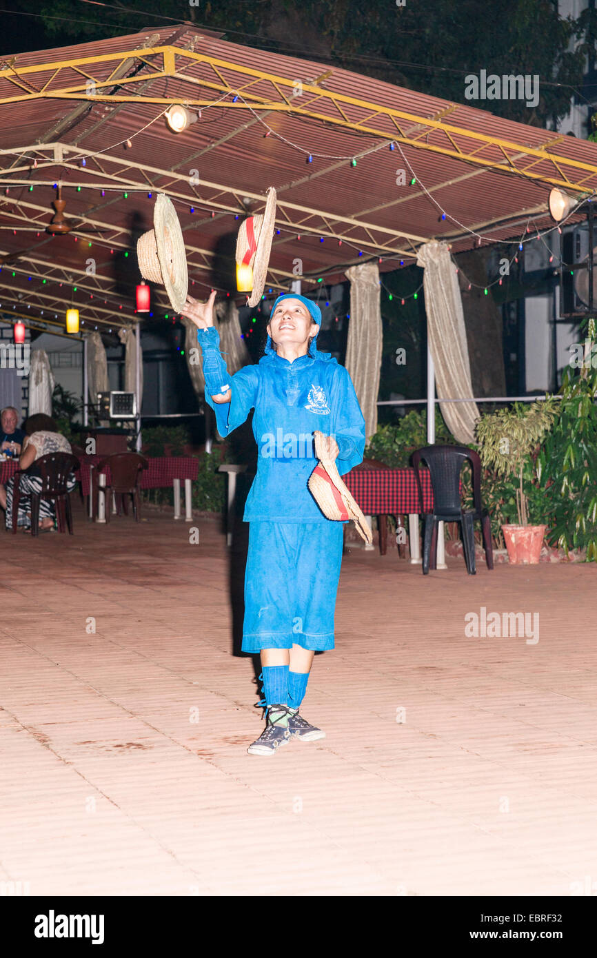 Tibetan fire dancers performing in gardens of a hotel in Goa for ...