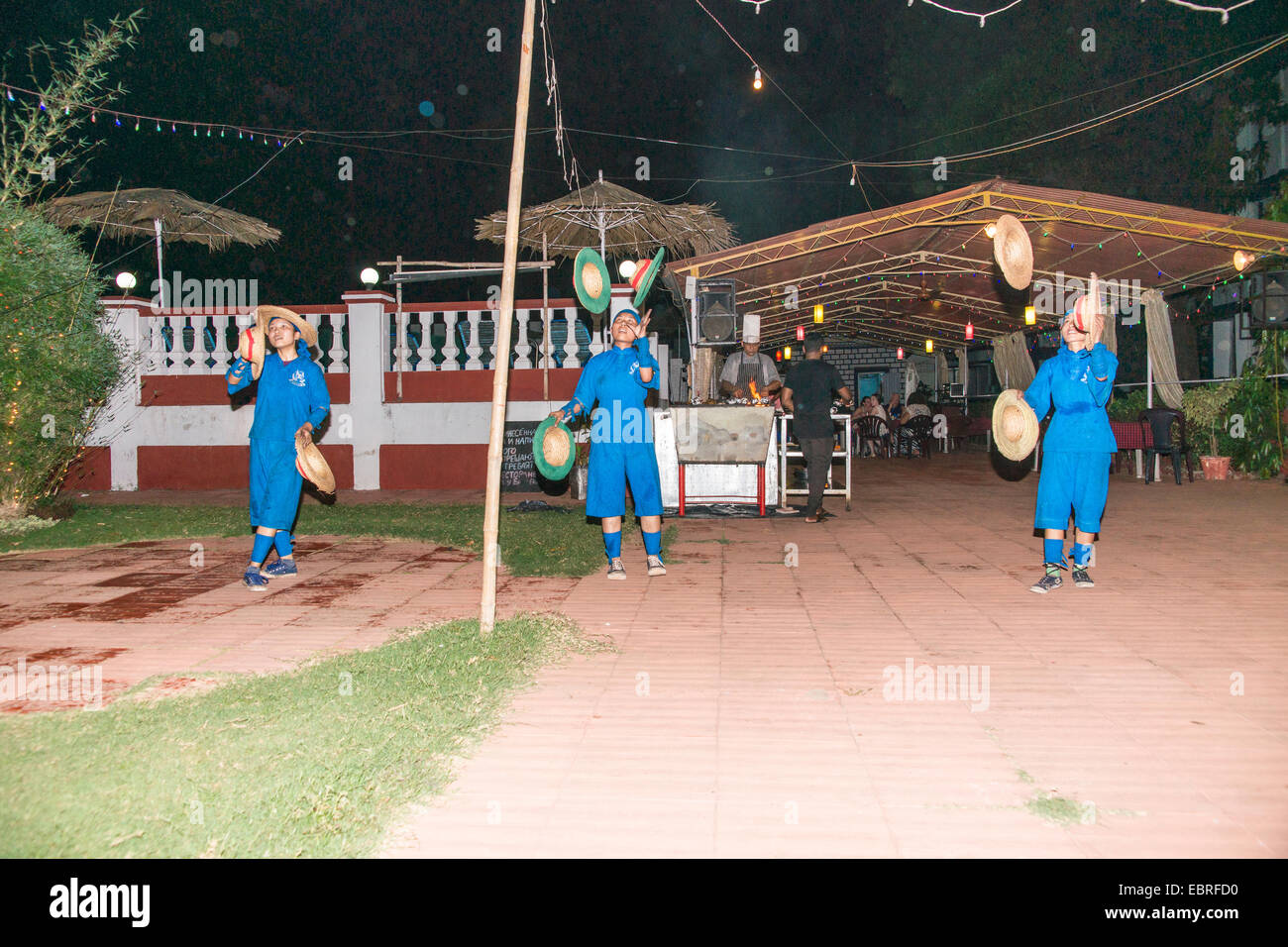 Tibetan fire dancers performing in gardens of a hotel in Goa for ...