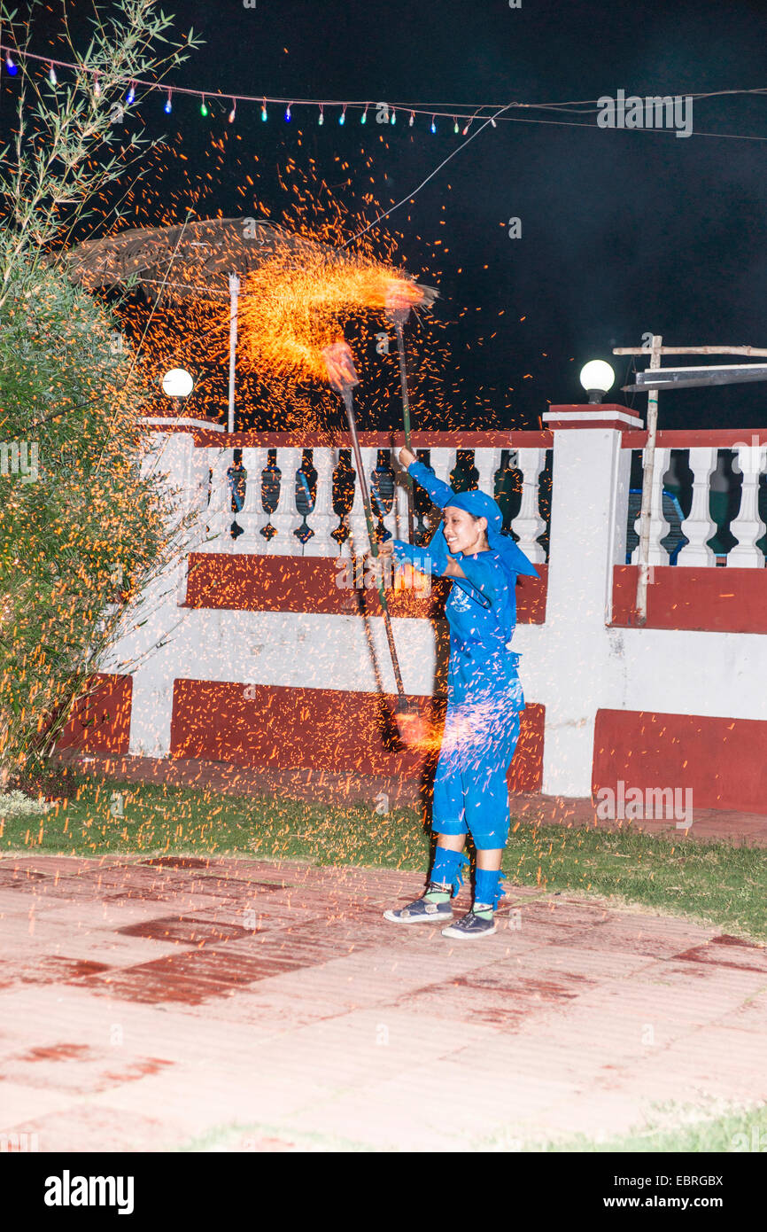 Tibetan fire dancers performing in gardens of a hotel in Goa for ...