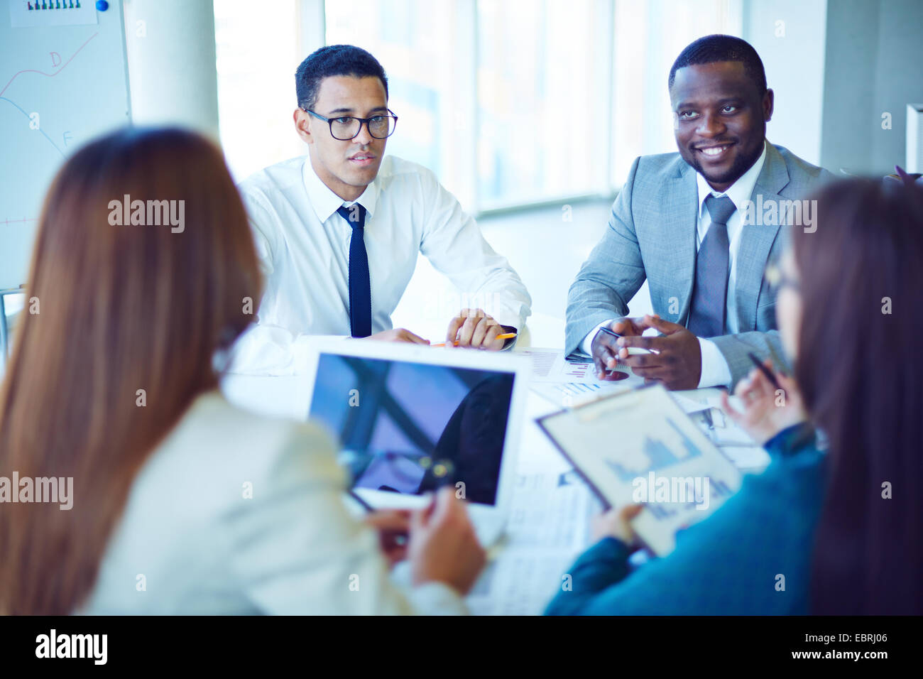 Business partners communicating in hi-res stock photography and images ...