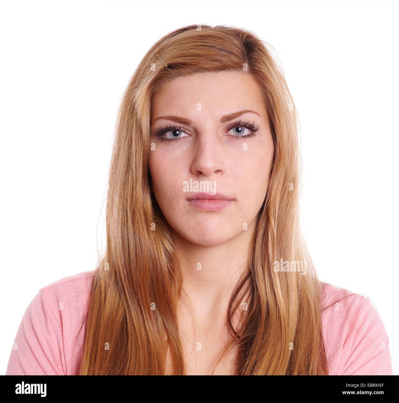 young woman with neutral expression headshot Stock Photo - Alamy