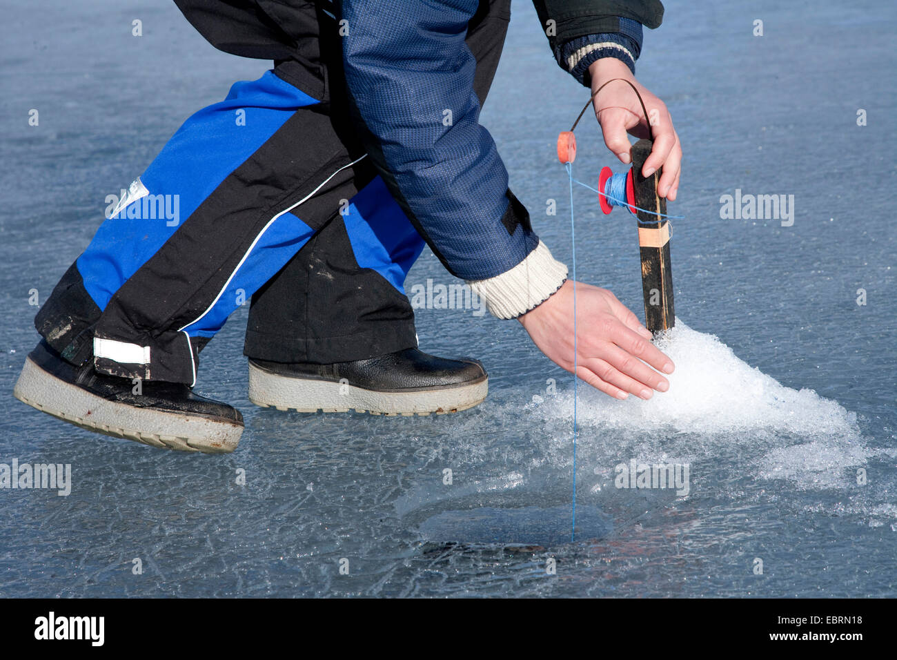 Man fixing ice angler in hi-res stock photography and images - Alamy