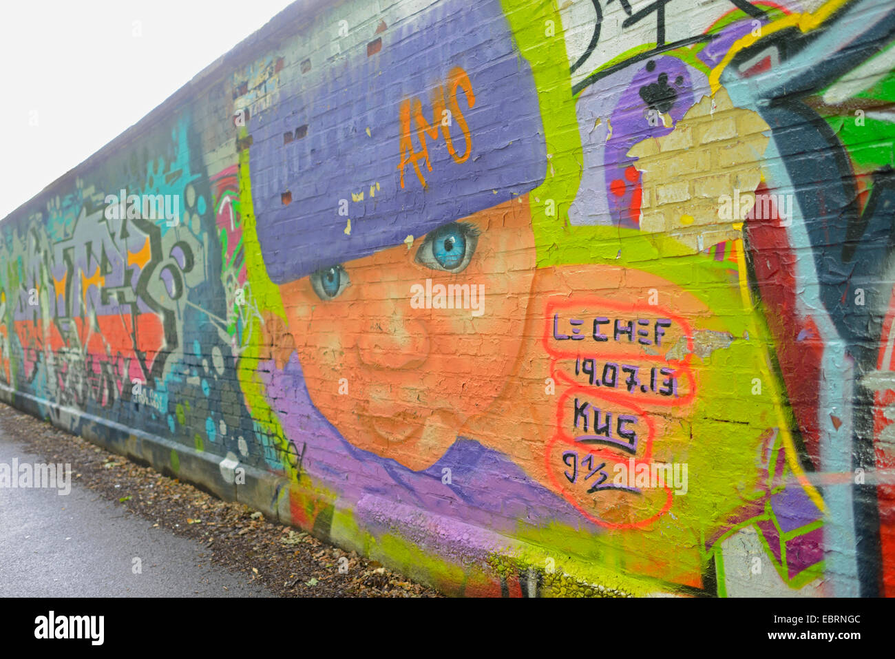 baby as graffiti on a wall, portrait, Germany, Bavaria, Stein Stock ...