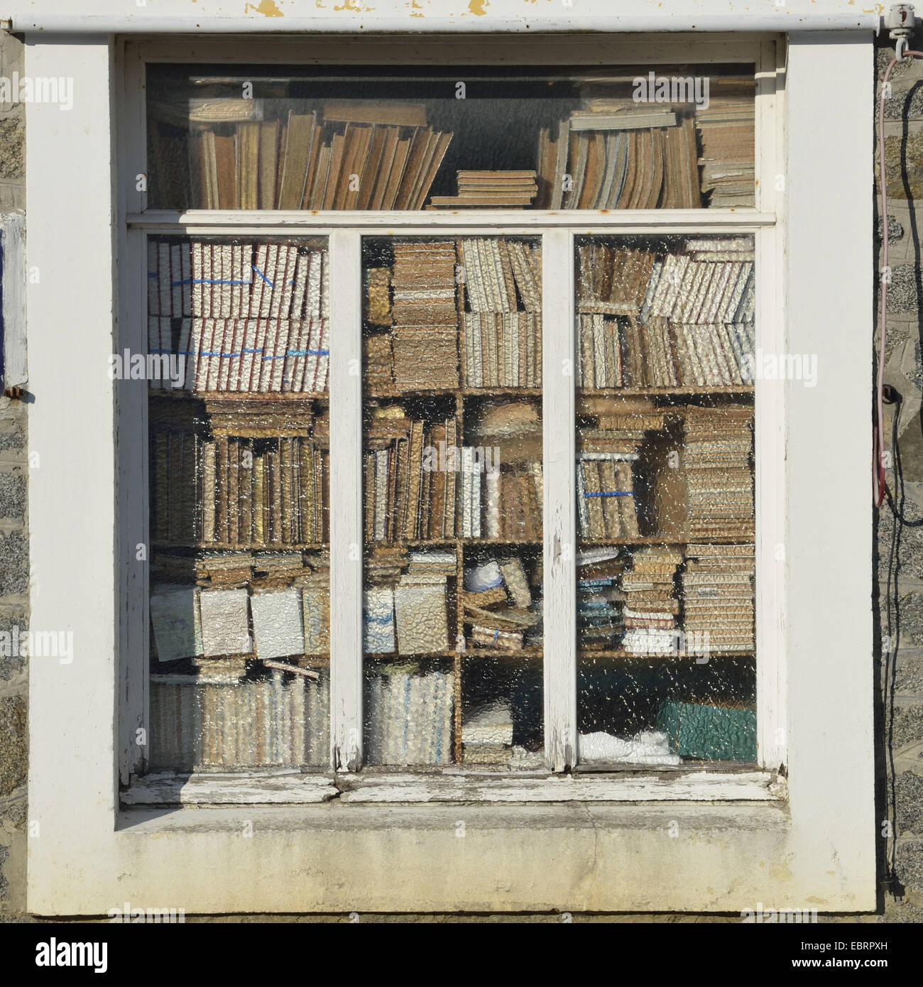 insight through a window, blocked with books, Used bookstore, France ...