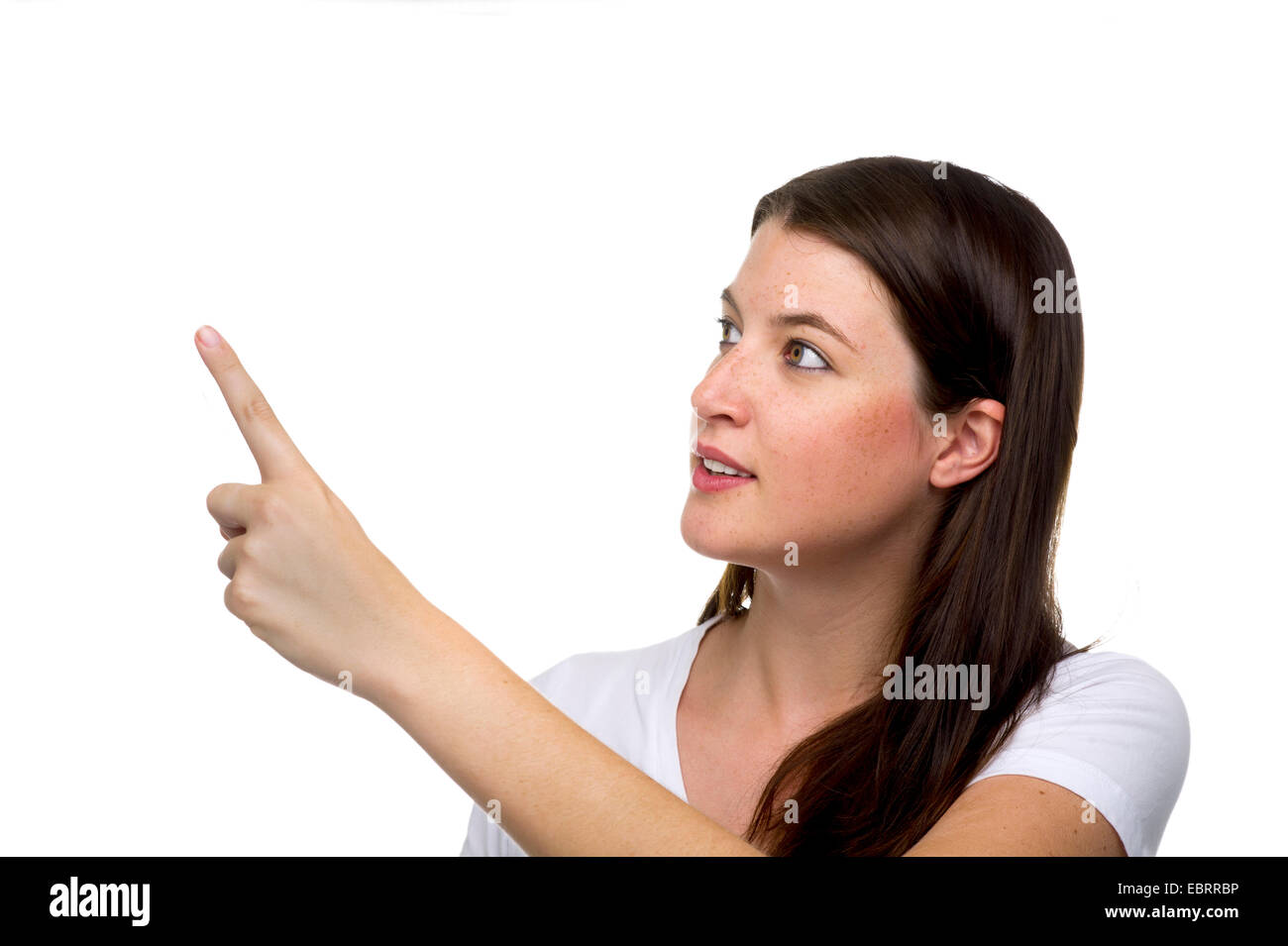 young darkhaired woman showing something with forefinger Stock Photo ...