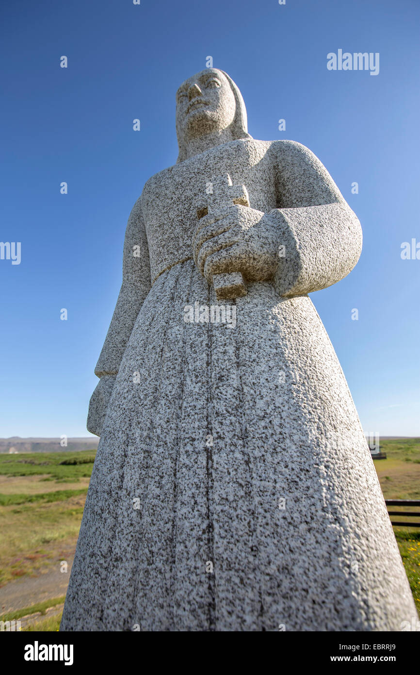 A statue next to the Strandarkirkja, Iceland Stock Photo - Alamy