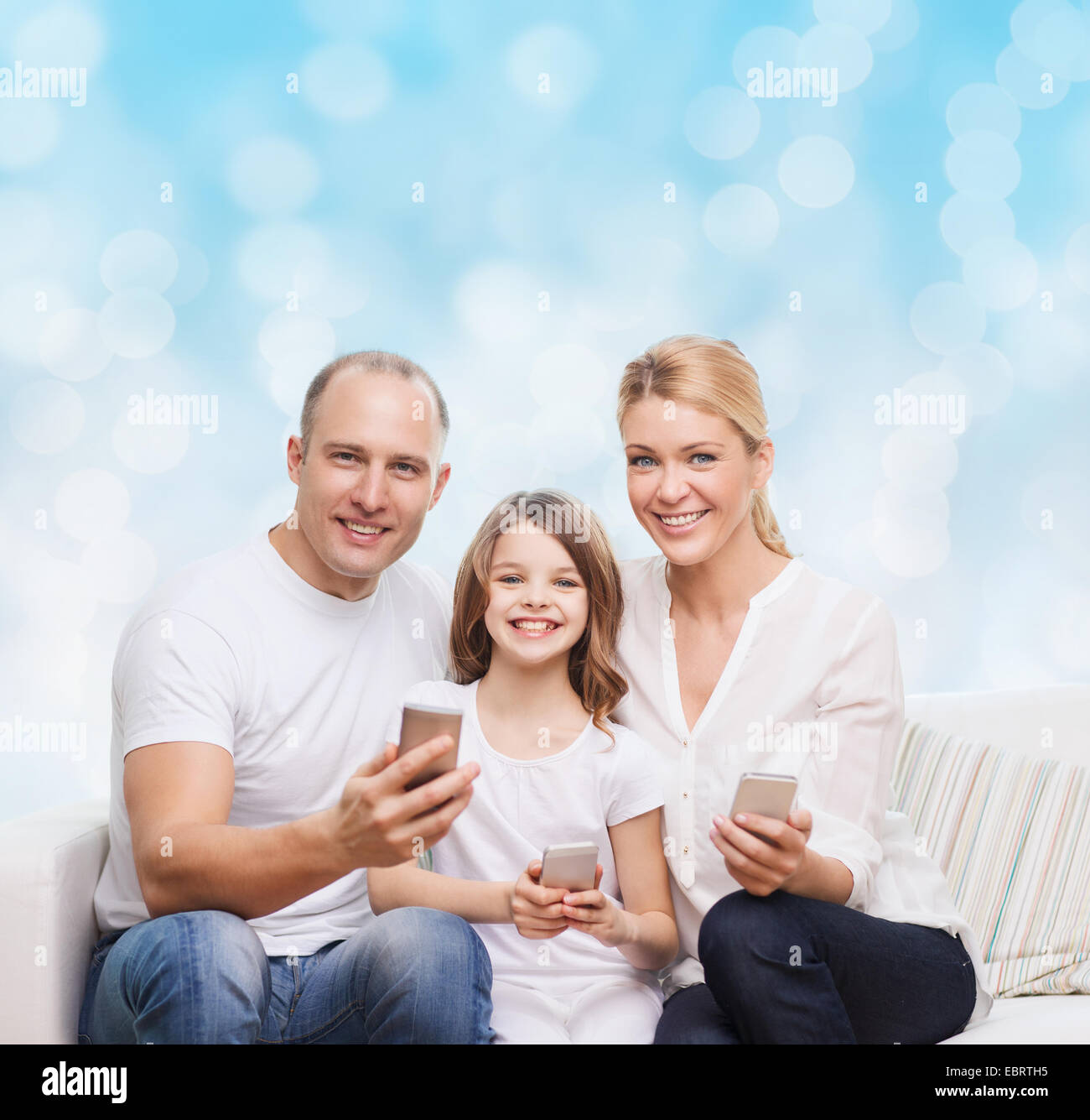 happy family with smartphones Stock Photo - Alamy