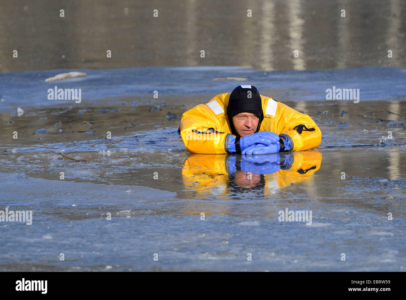 firefighers practising rescue on frozen lake, Germany Stock Photo - Alamy