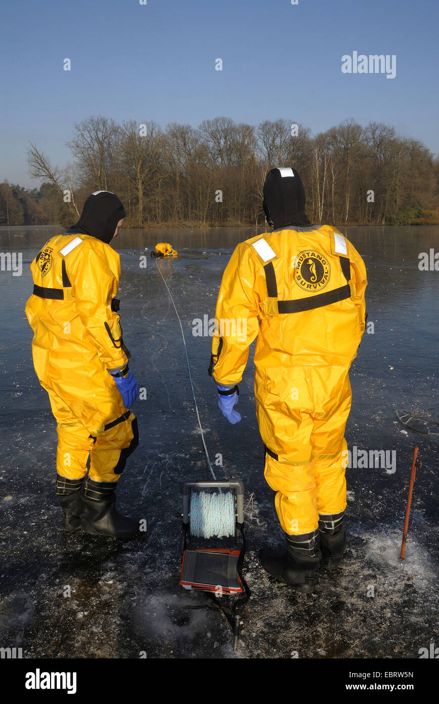 firefighers practising rescue on frozen lake, Germany Stock Photo - Alamy