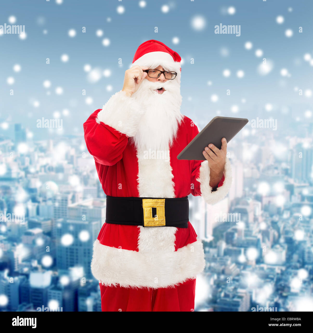 man in costume of santa claus with tablet pc Stock Photo - Alamy