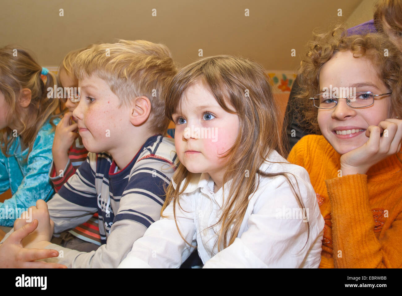 Group of a small children sitting in front of computer Stock Photo - Alamy