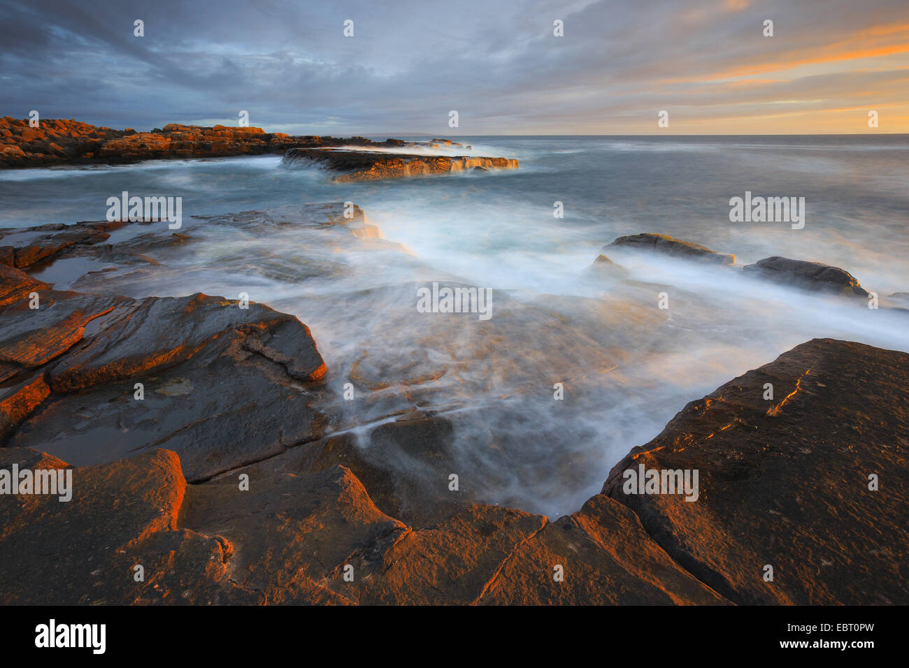 Rocky ocean coast at the sunset hi-res stock photography and images - Alamy