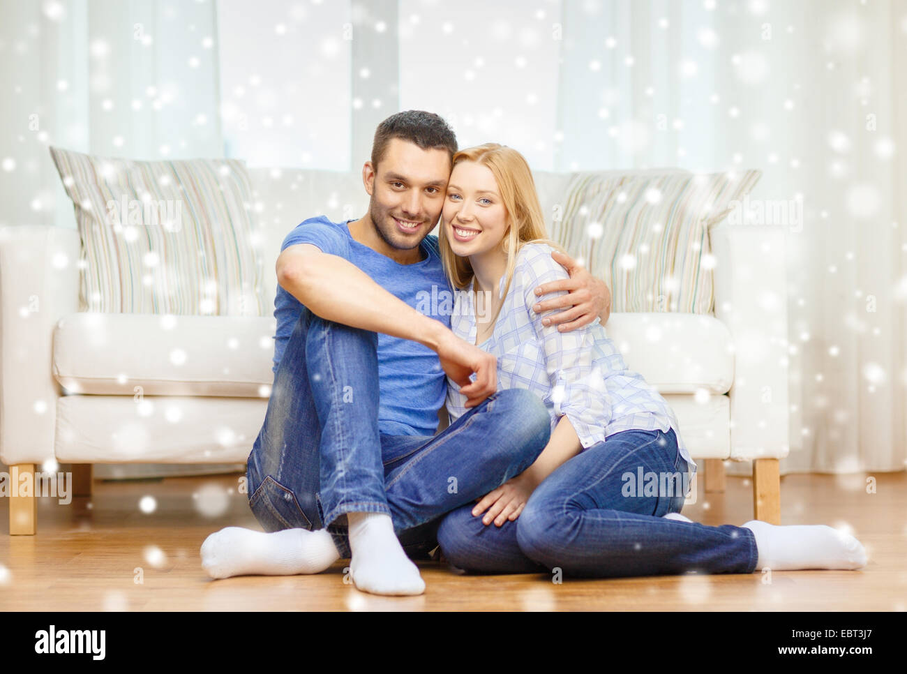 Lovers man woman sitting hugging hi-res stock photography and images ...