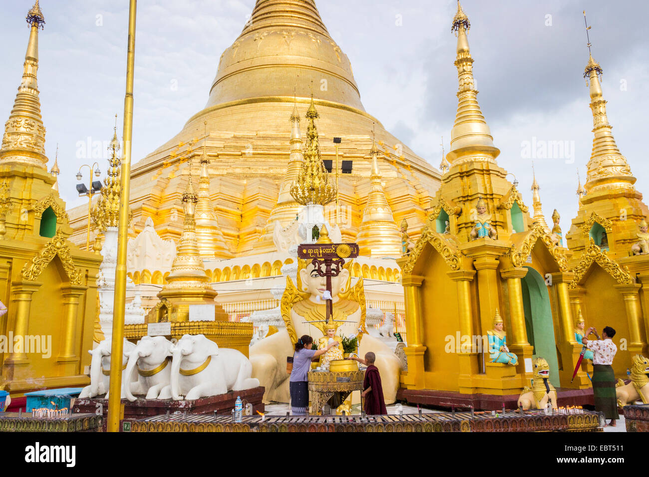 Buddhism meets technology at Shwedagon Pagoda Stock Photo - Alamy