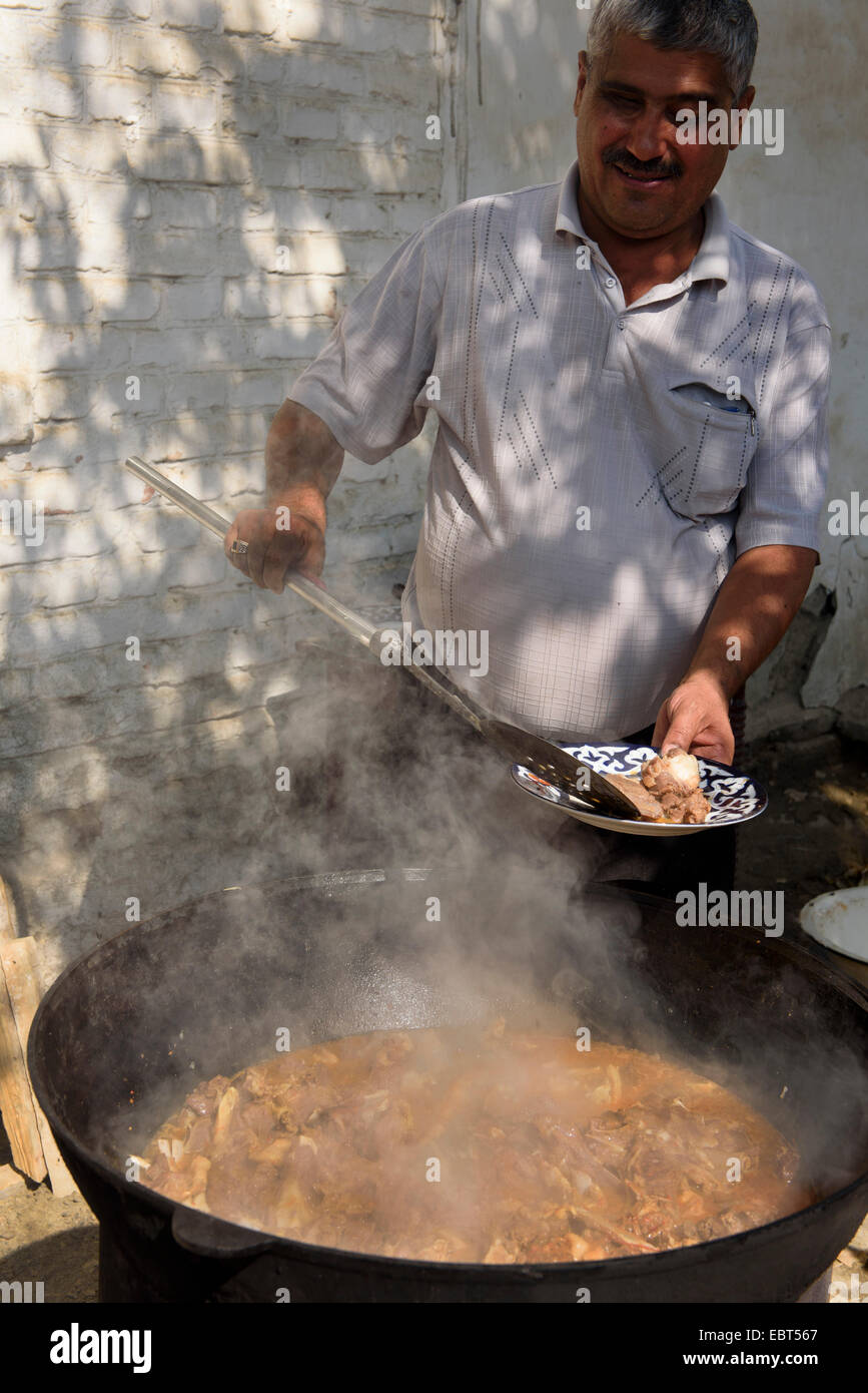 cooking on the street, Bukhara, Uzbekistan, Asia Stock Photo - Alamy